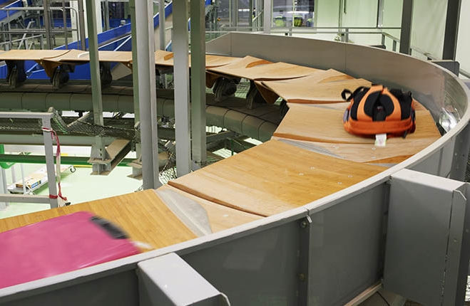 Trieur pour aéroport - HELIXORTER - VANDERLANDE - vertical / à plateau ...